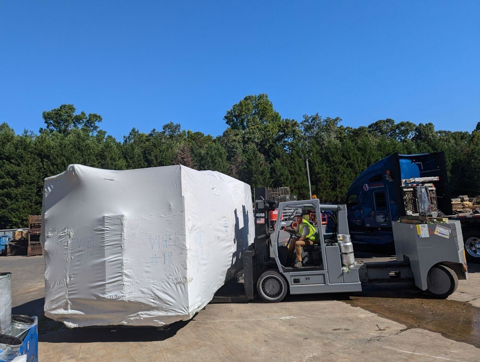 Heavy Equipment Unloading: Overcoming Common Challenges - Alltracon ...